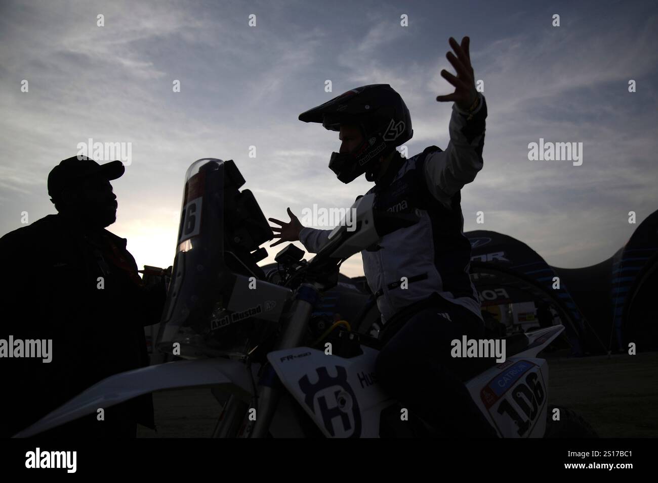 Rider Axel Mustad of Norway speaks with a local people two days before ...