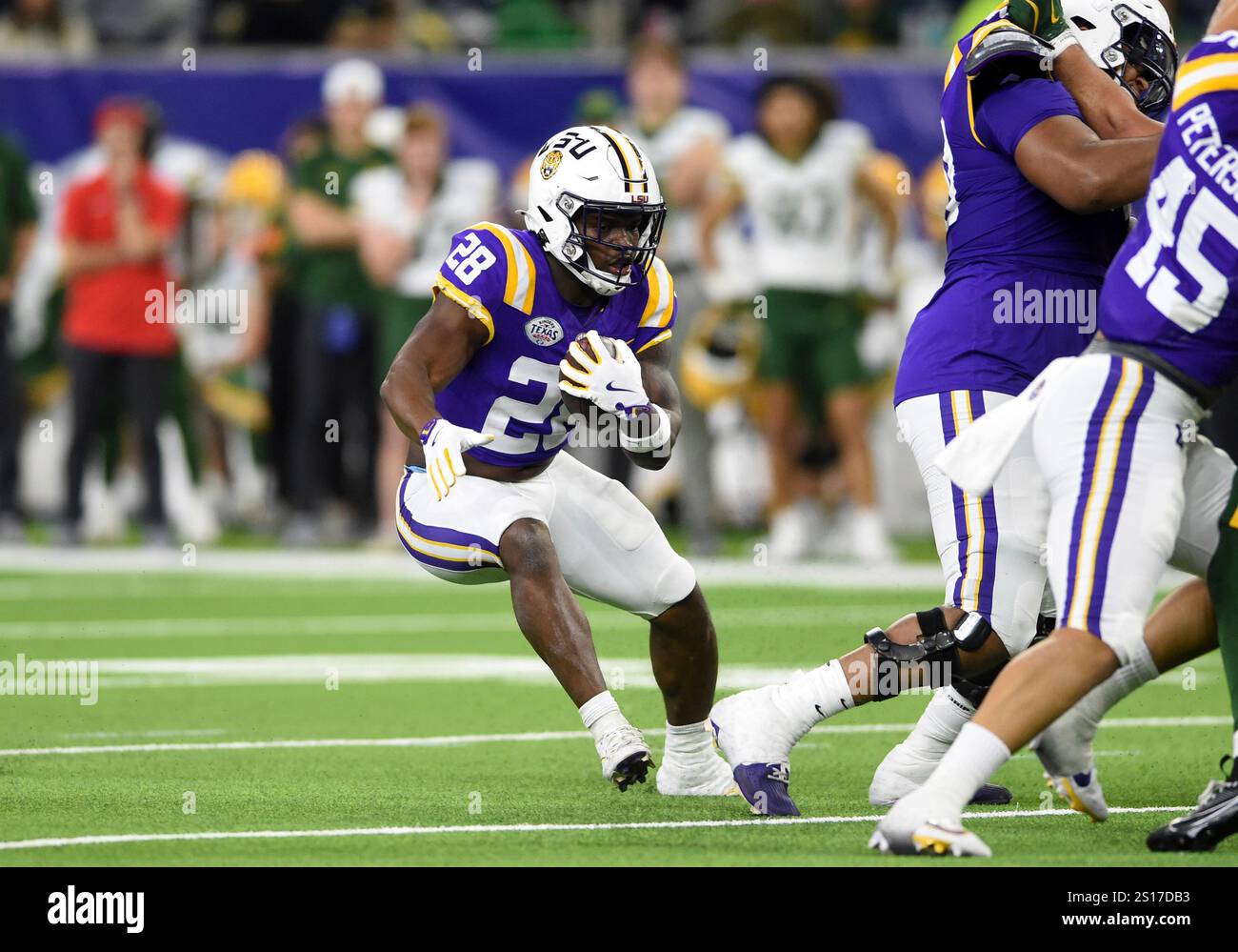 HOUSTON, TX - DECEMBER 31: LSU Tigers RB Kaleb Jackson (28) runs for ...