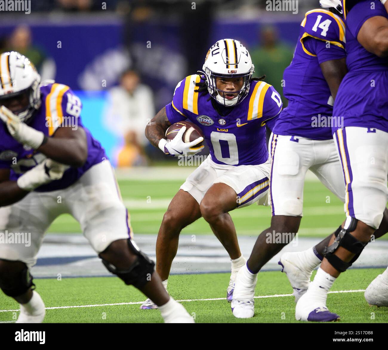 HOUSTON, TX - DECEMBER 31: LSU Tigers WR Zavion Thomas runs for yardage during the Kinder's ...