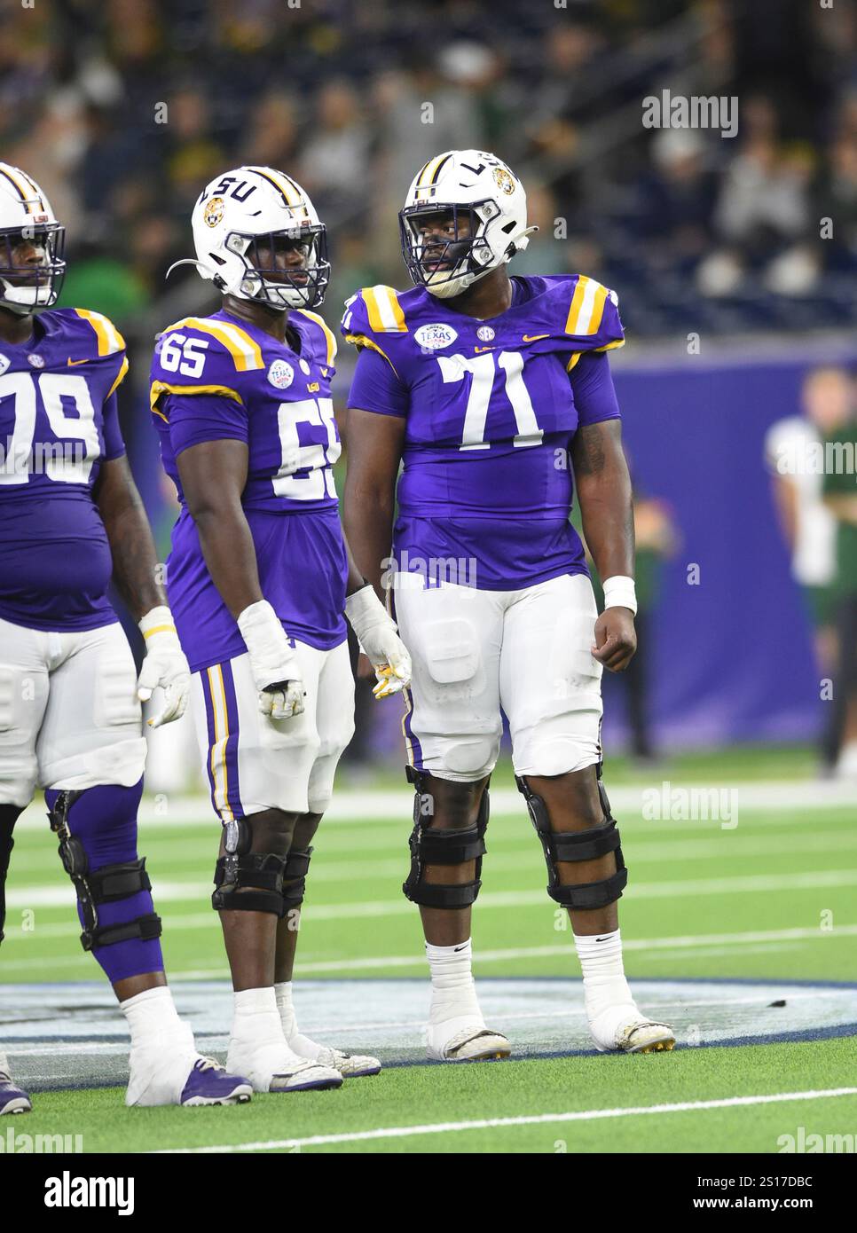 HOUSTON, TX - DECEMBER 31: LSU Tigers lineman Tyree Adams gets ready ...