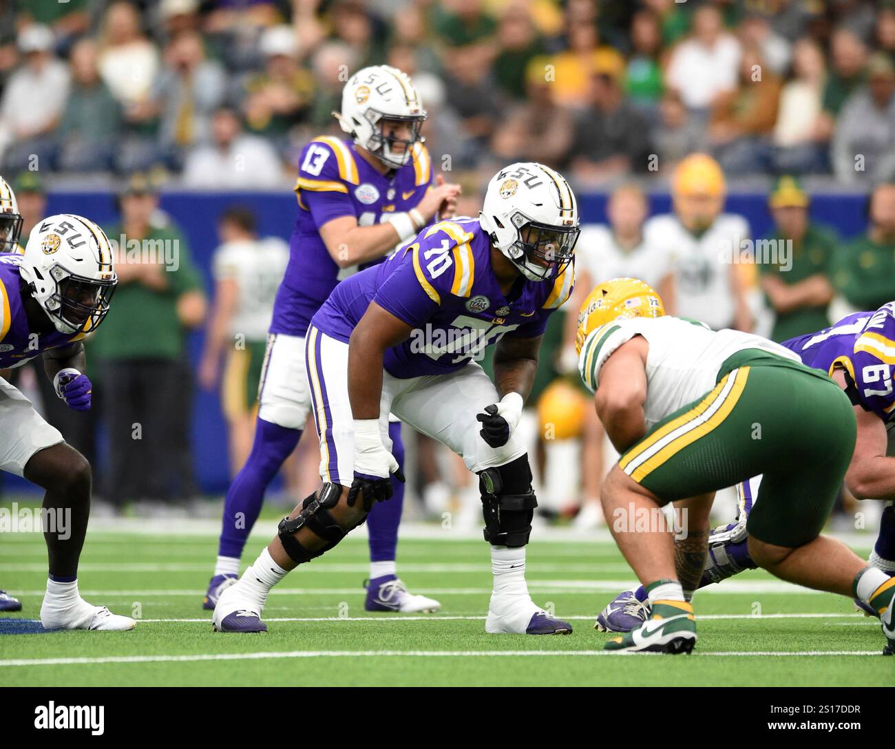 HOUSTON, TX - DECEMBER 31: LSU Tigers tackle Miles Frazier lines up for a play during the Kinder ...