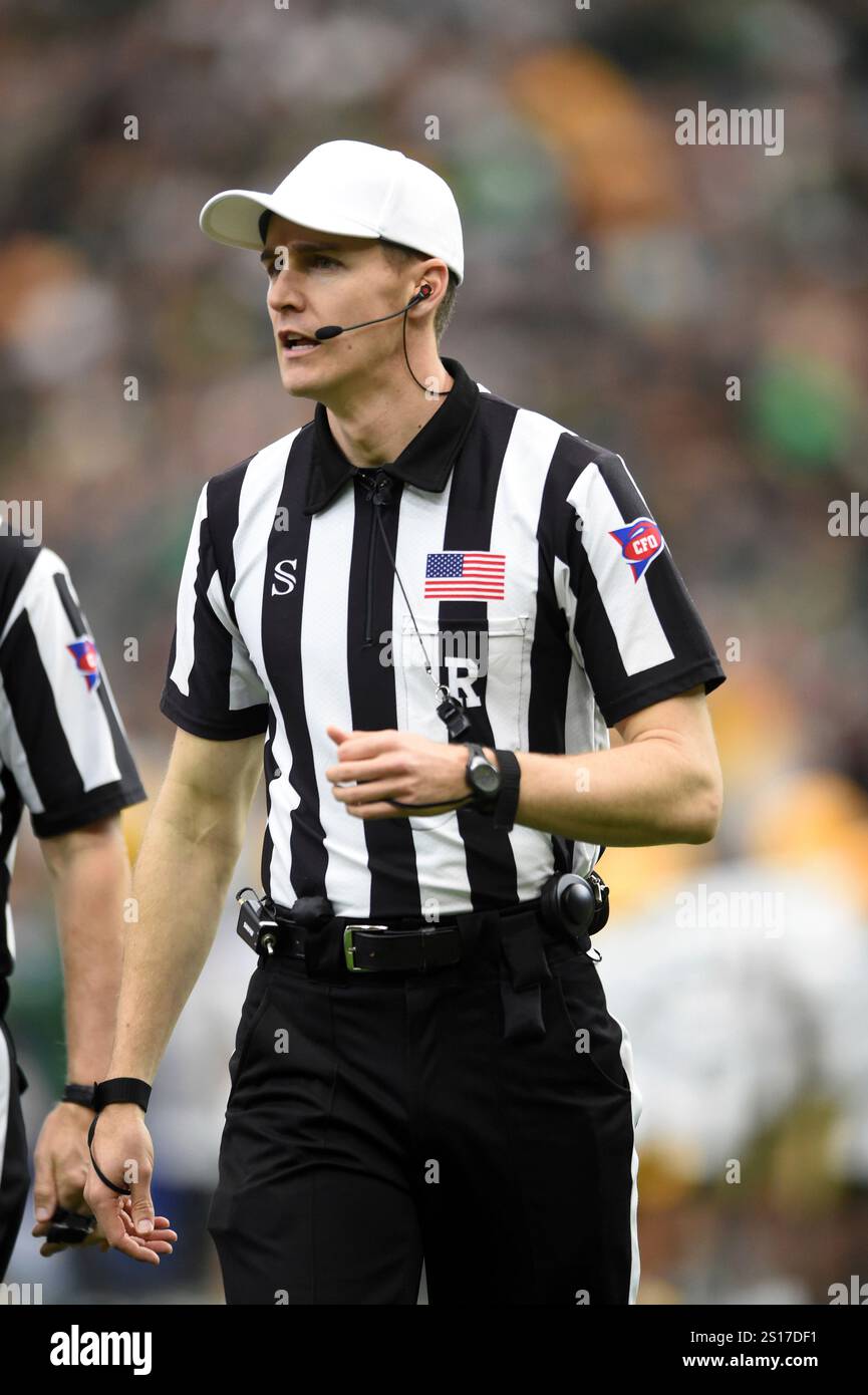 HOUSTON, TX - DECEMBER 31: Referee Justin Elliot makes an announcement ...