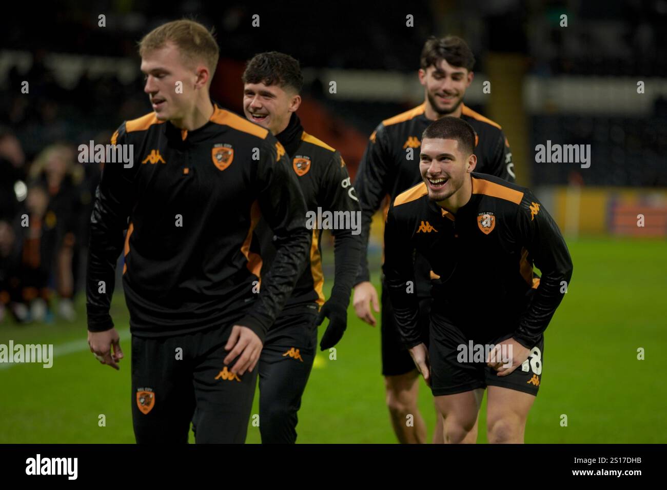 Hull City's Xavier Simons (right) during the warm up before the Sky Bet ...