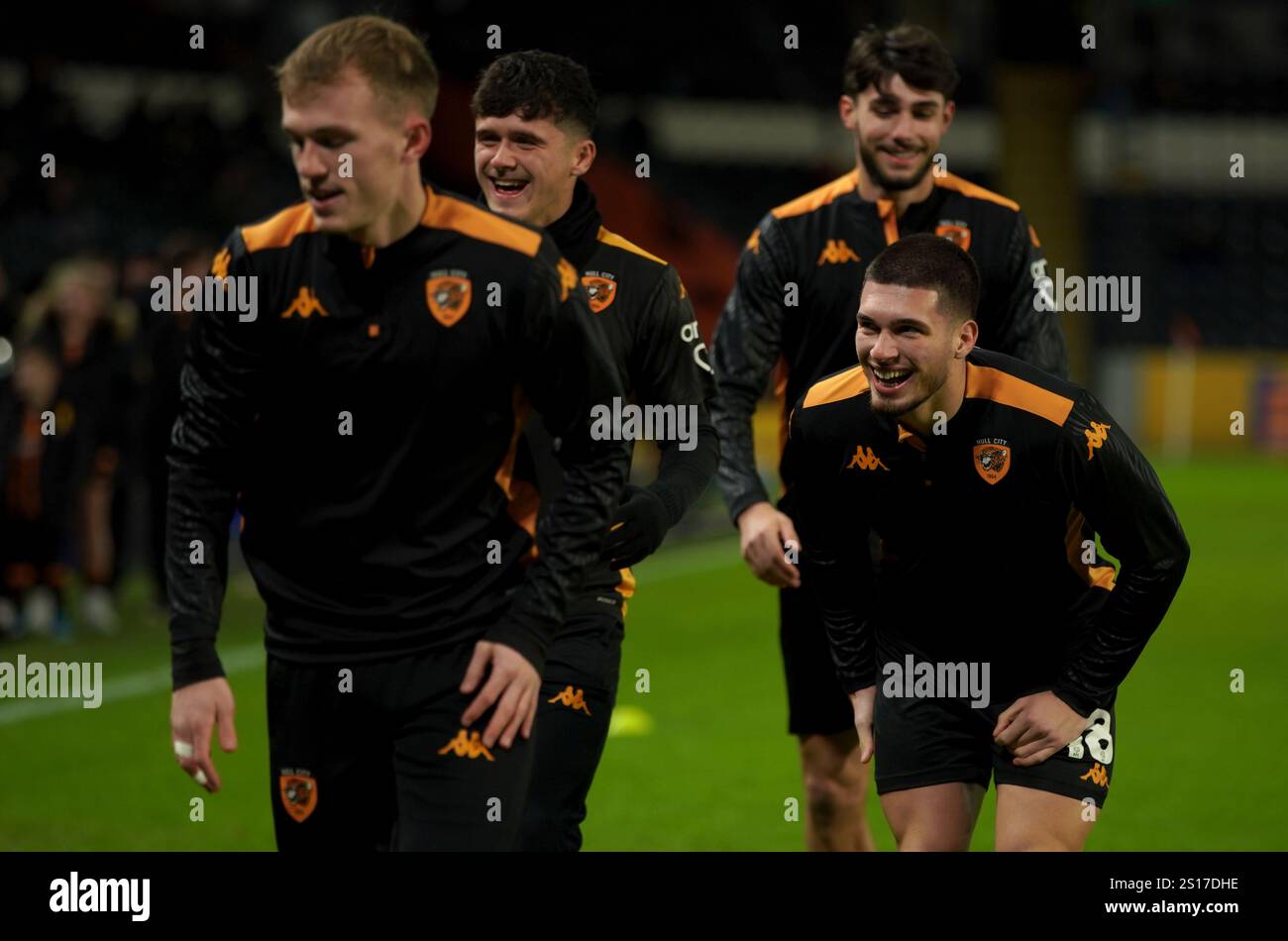 Hull City's Xavier Simons (right) during the warm up before the Sky Bet ...