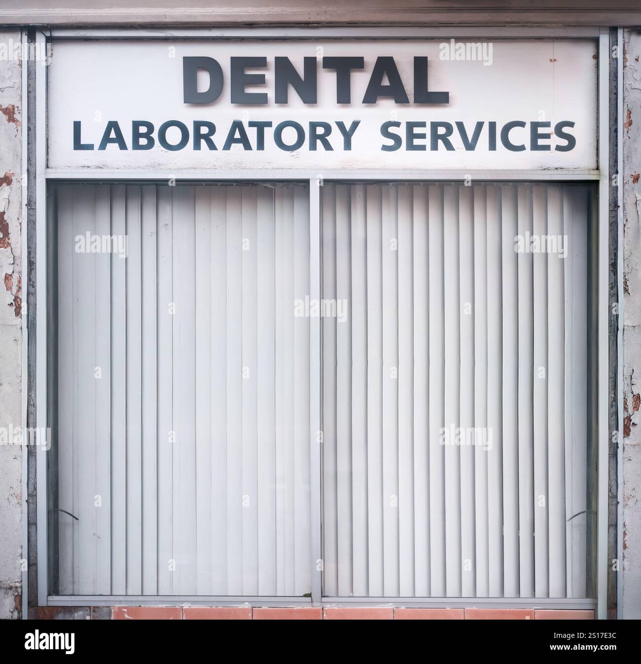 A Rundown Dental Laboratory Service Shop-Front Stock Photo - Alamy