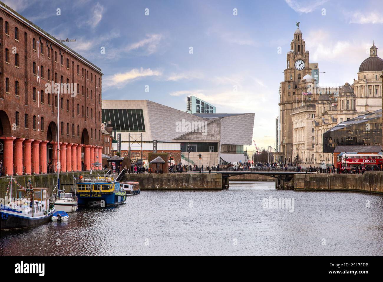 Boats moored by the buildings of the Albert Docks in the Merseyside ...