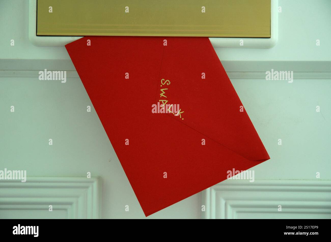 Red letter with SWALK on it, posted through door Stock Photo - Alamy