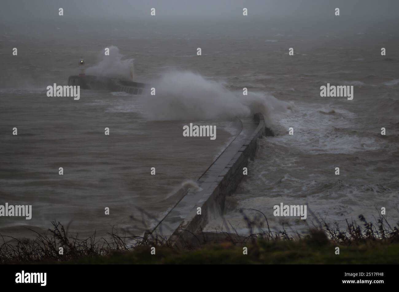 Newhaven, East Sussex, UK. 1st Jan, 2025. Gale force winds whip the sea ...