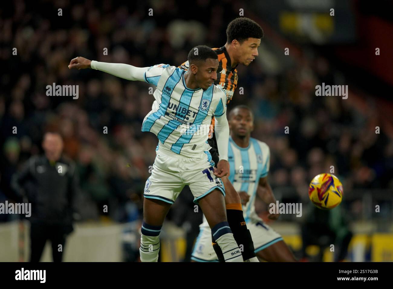 Middlesbrough's Isaiah Jones (left) and Hull City's Mason Burstow ...