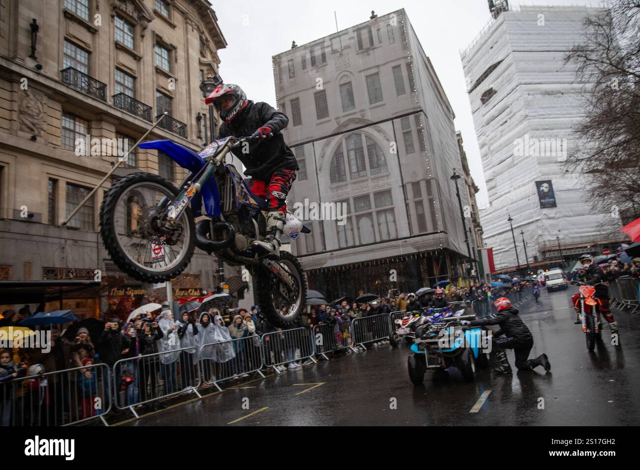 London, UK, 1st January 2025. A stunt bike rider makes a jump on a ...