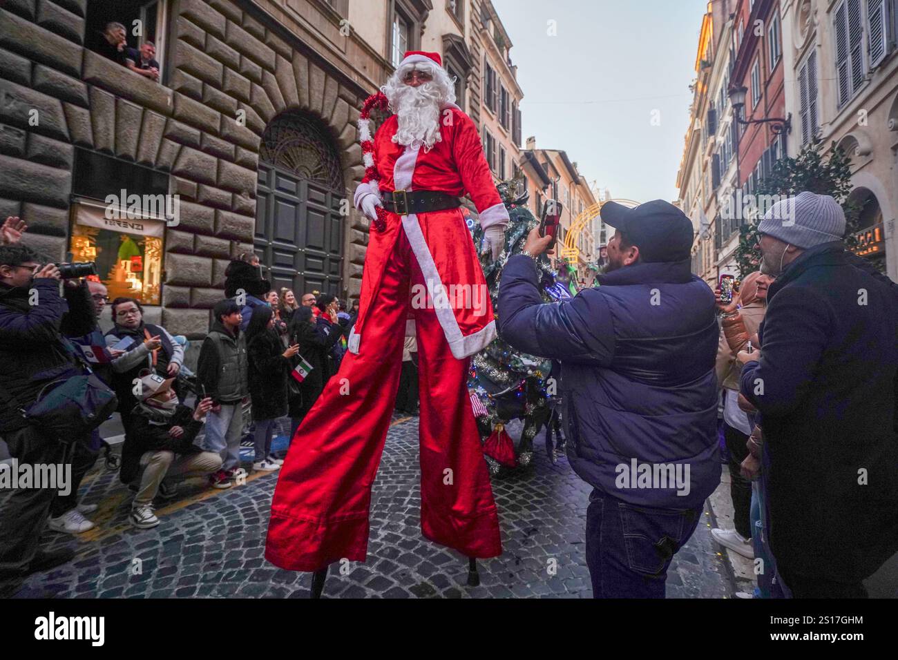 Rome, Italy 1 January 2025 A Santa on stilts performing during a major ...