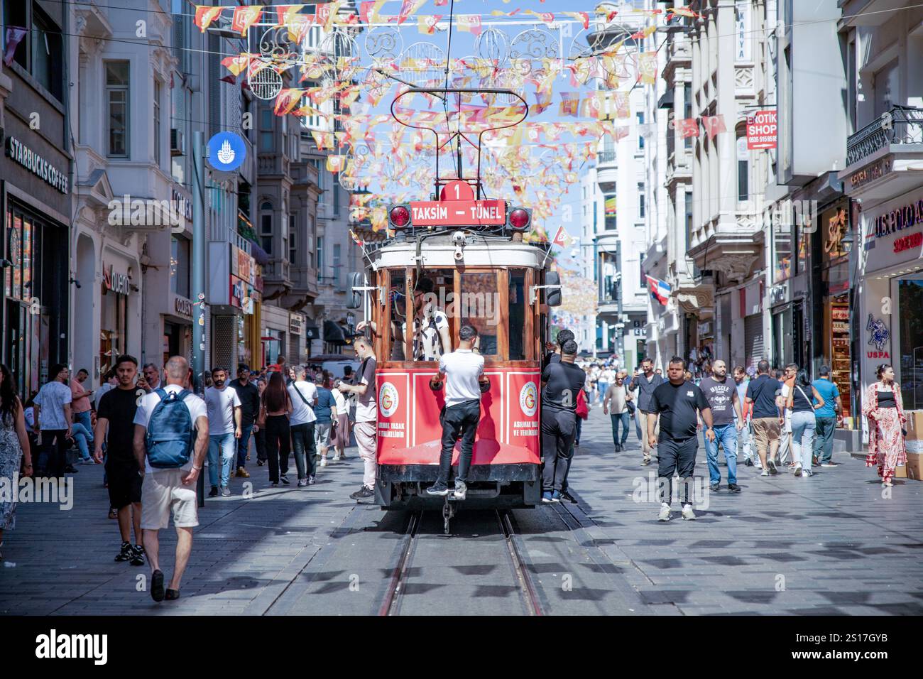 The red nostalgic tram on the Taksim-Tunel Nostalgia Tramway in ...