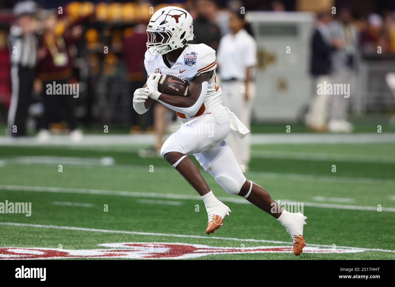 Atlanta, United States. 01st Jan, 2025. Texas running back Quintrevion ...