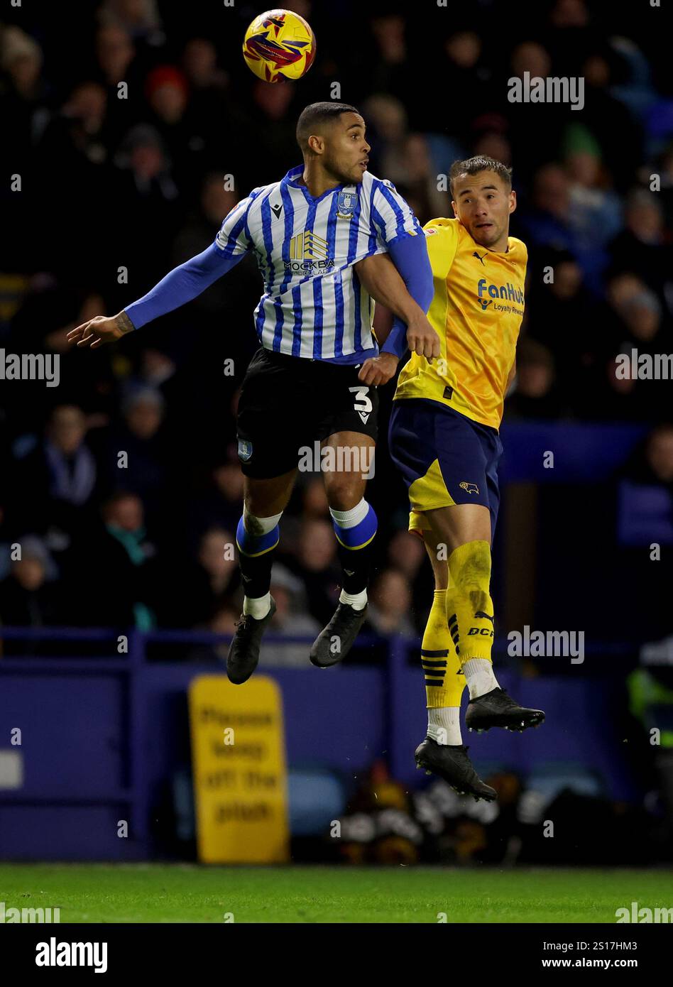 Sheffield Wednesday's Max Lowe (left) and Derby County's Kane Wilson ...