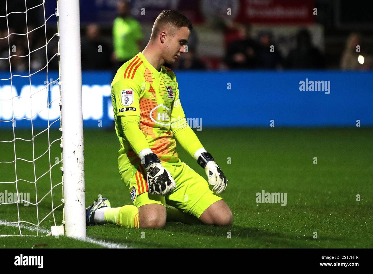 Exeter City goalkeeper Joe Whitworth reacts after conceding their teams ...