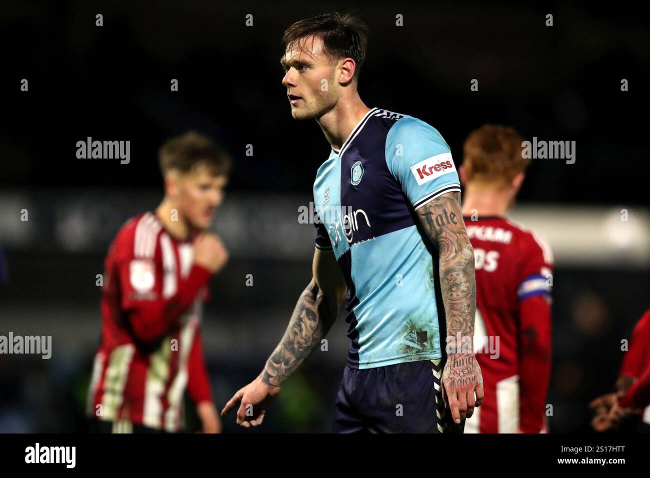Wycombe Wanderers' Joe Low gestures at Exeter City goalkeeper Joe ...