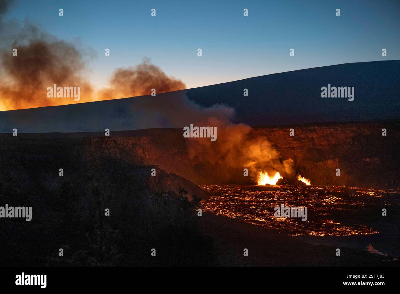 Carbondale, Colorado, USA. 30th Dec, 2024. Fiery lava fountains light ...