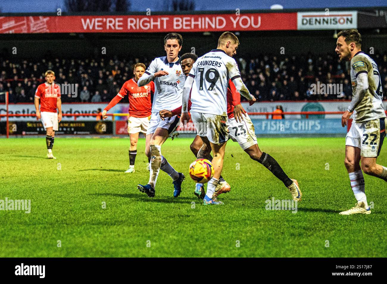 Morecambe FC's David Tutonda wrong foots Harvey Saunders of Tranmere ...