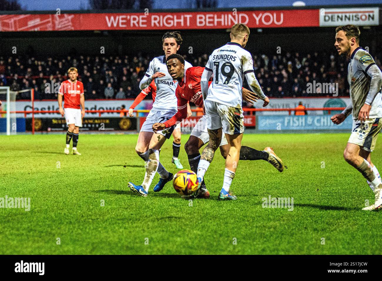 Morecambe FC's David Tutonda wrong foots Harvey Saunders of Tranmere ...