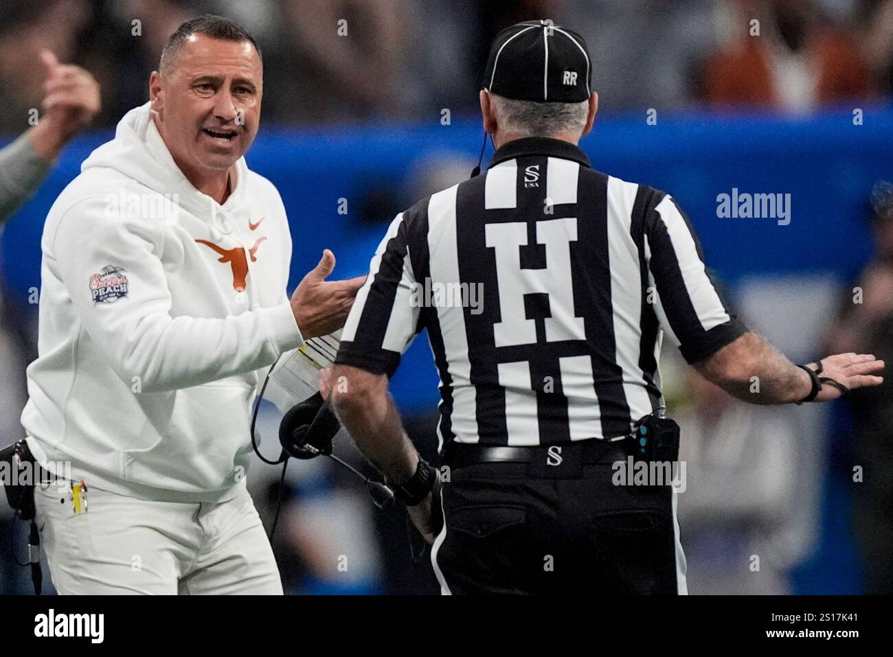 Texas head coach Steve Sarkisian speaks with an official during the ...
