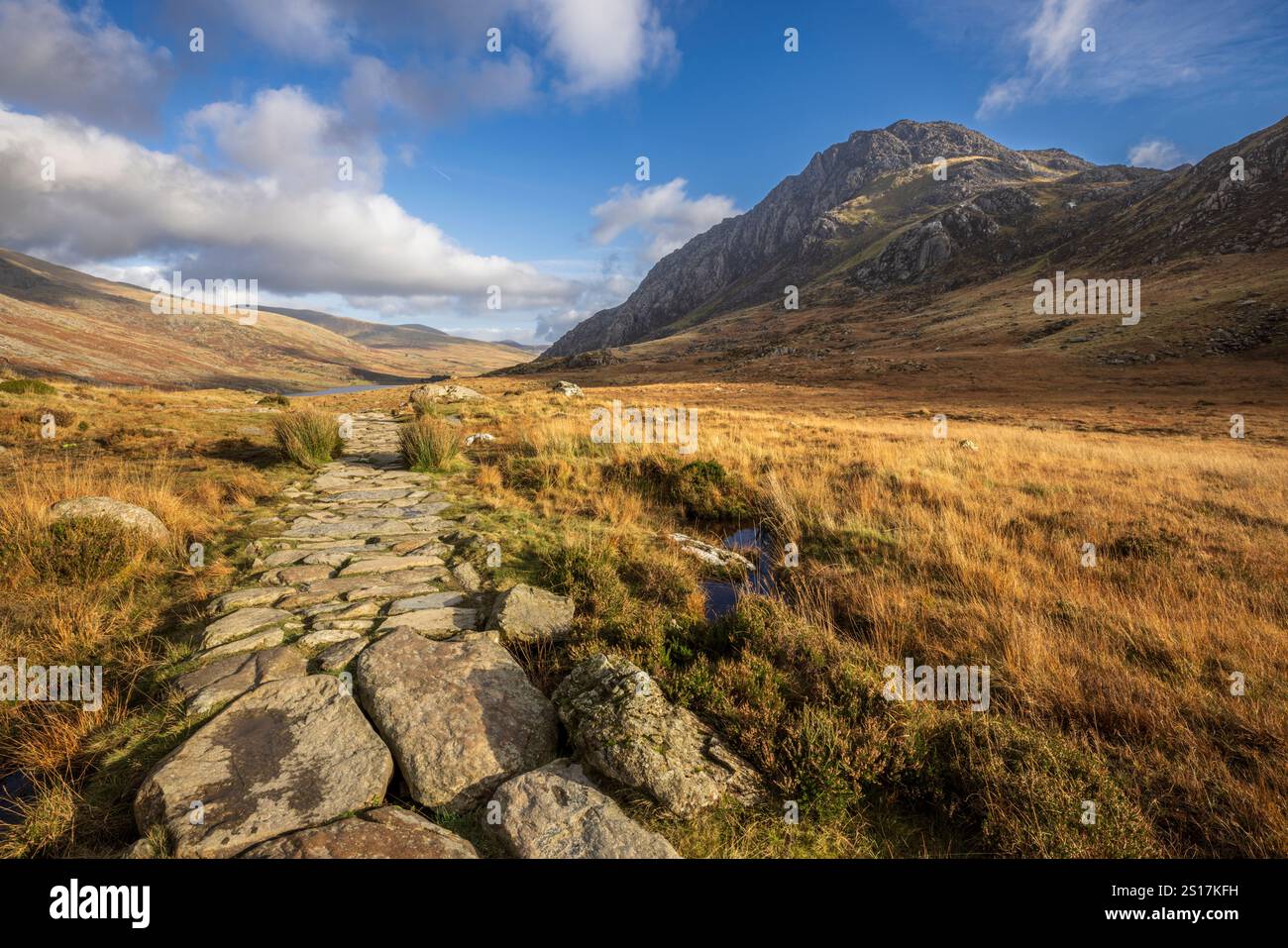 The stone path from Llyn Idwal to Llyn Ogwen with Tryfan Mountain in ...