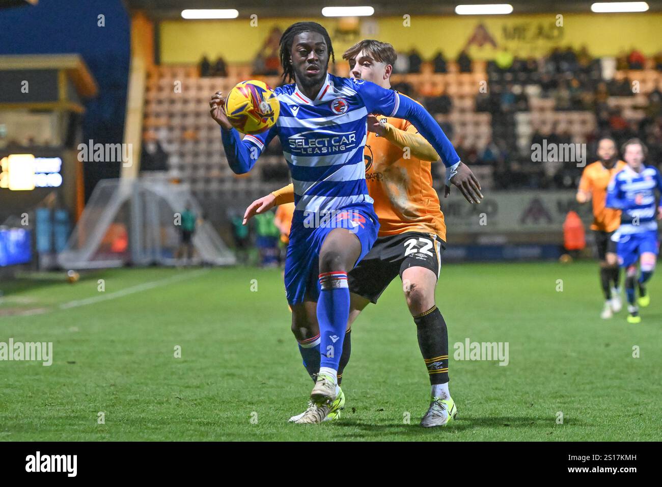 Abraham Kanu (32 Reading) challenged by Josh Stokes (22 Cambridge ...