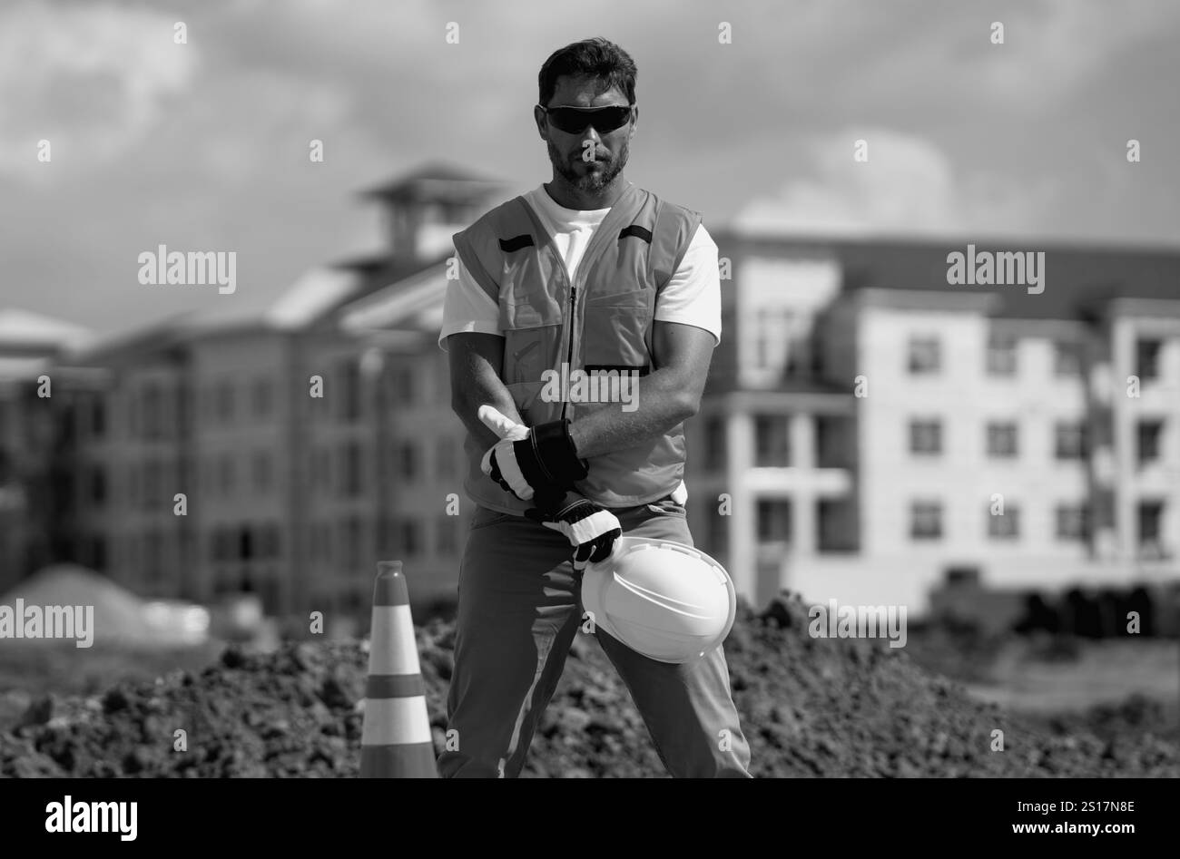Construction worker with hardhat helmet on construction site. Engineer ...