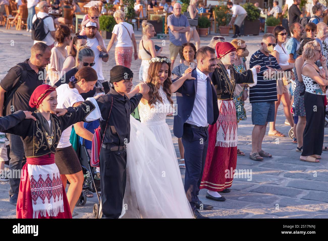 Group of people performing traditional Greek dance, Chania, Crete ...