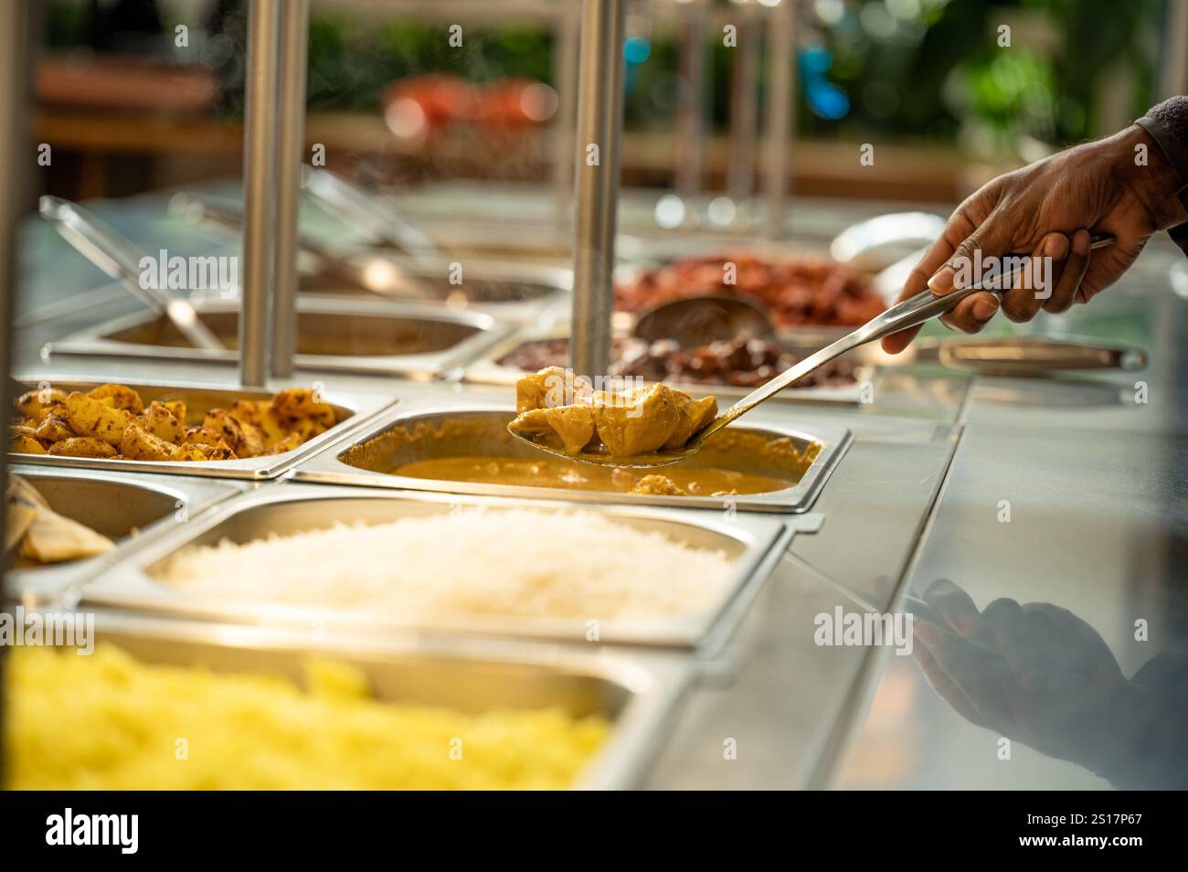 Asian food buffet in restaurant multiple food dishes and salad. Eat as ...