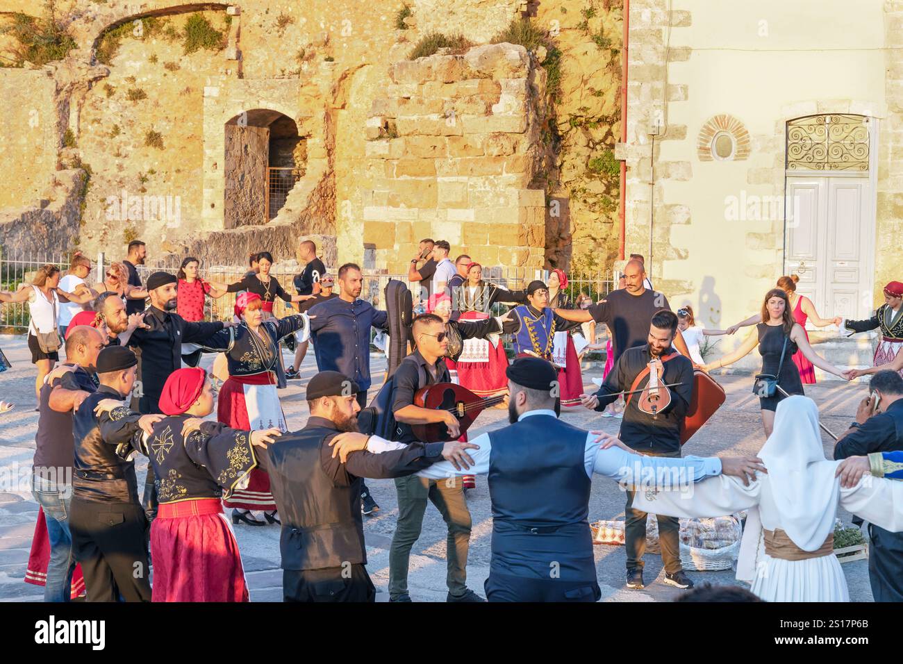 Group of people performing traditional Greek dance, Chania, Crete ...