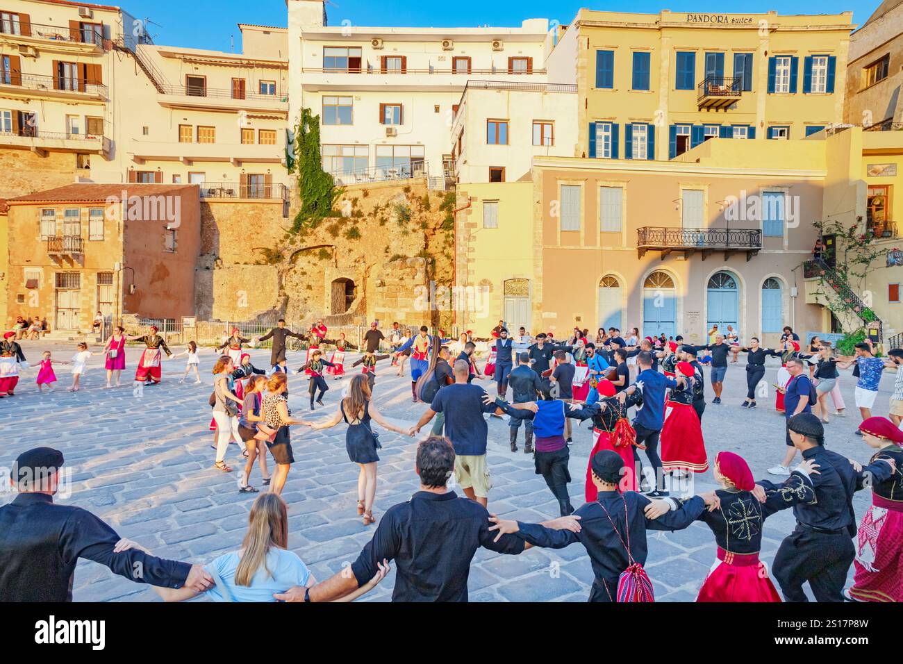 Group of people performing traditional Greek dance, Chania, Crete ...