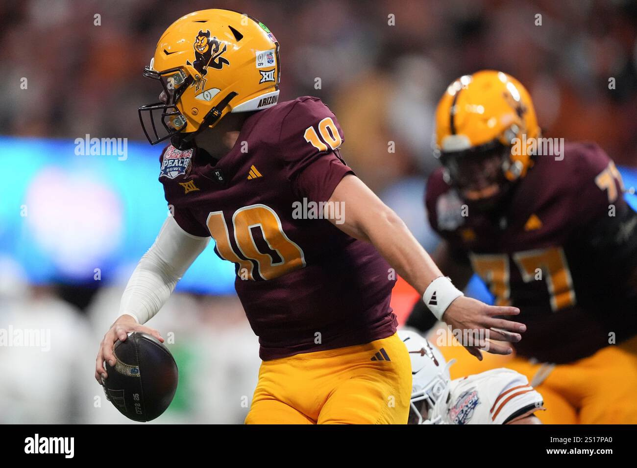 Arizona State quarterback Sam Leavitt (10) runs out of the pocket ...