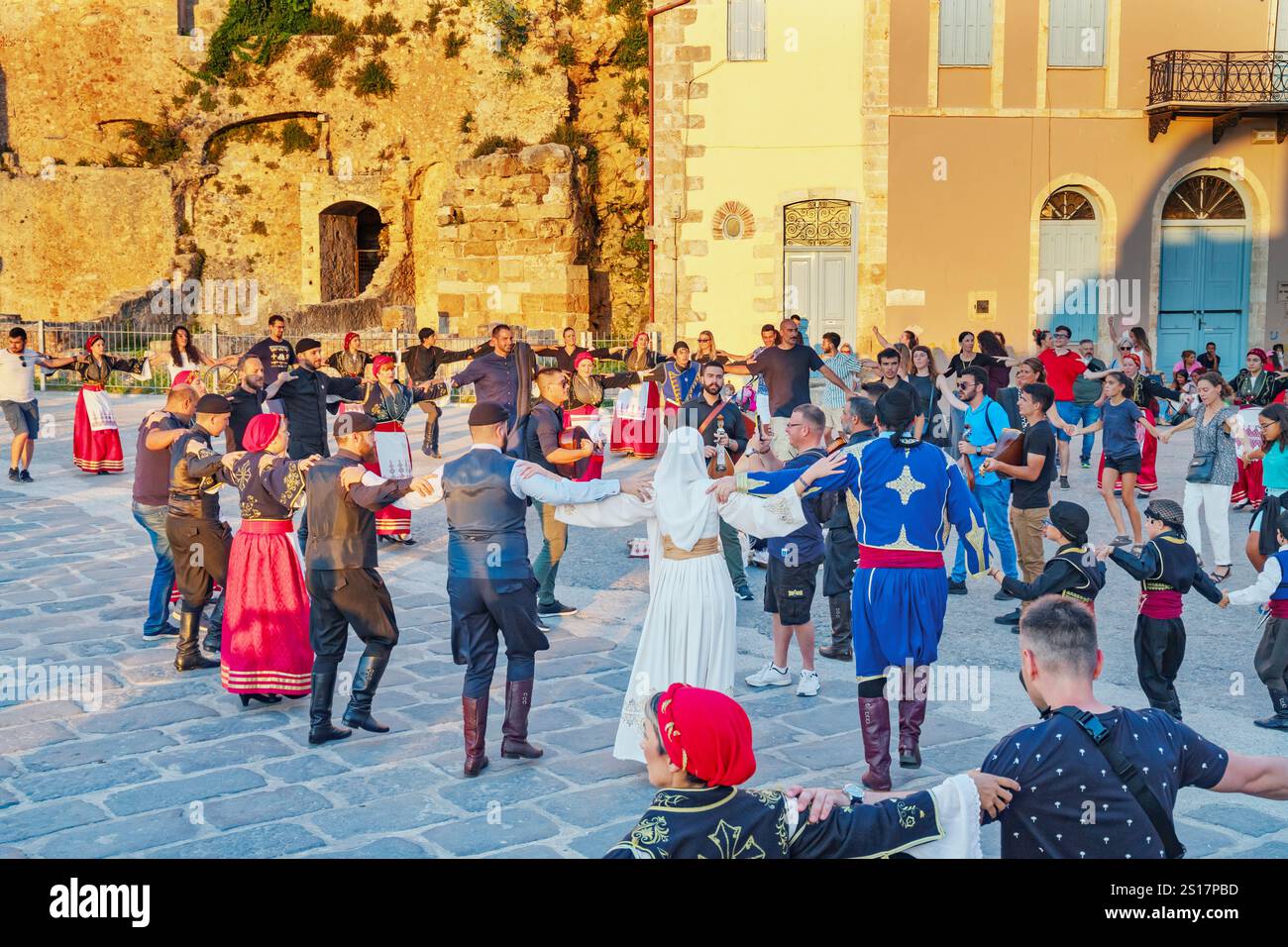 Group of people performing traditional Greek dance, Chania, Crete ...