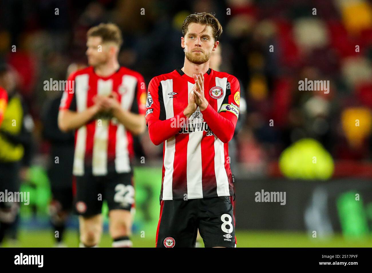 Mathias Jensen of Brentford acknowledges the fans after the teams ...