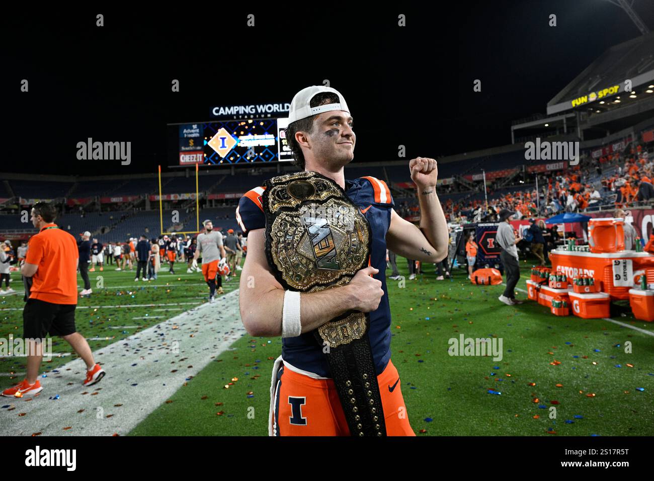 Illinois quarterback Luke Altmyer acknowledges fans in the stands after ...