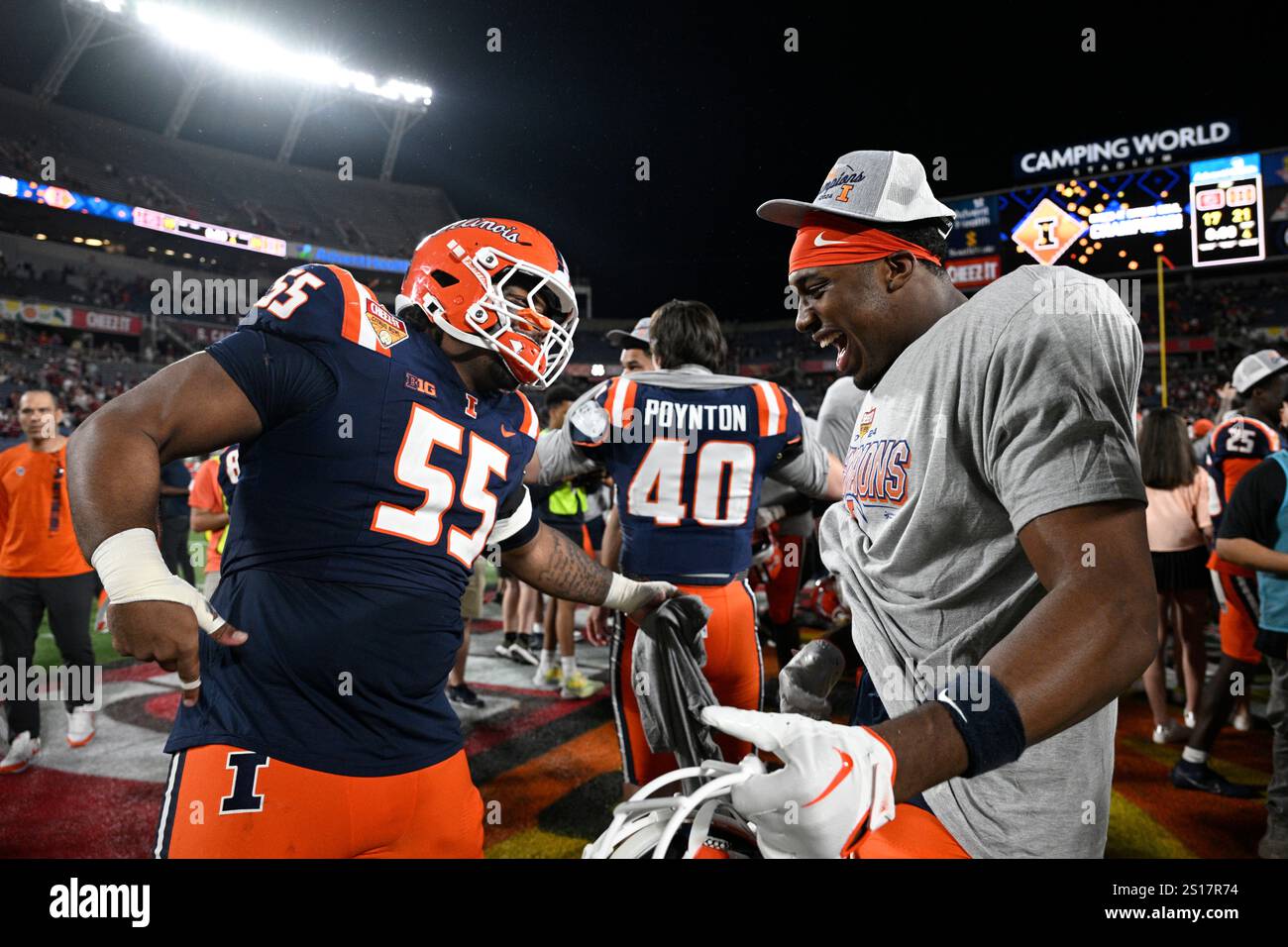 Illinois defensive lineman Jeremiah Warren (55) celebrates after a win ...