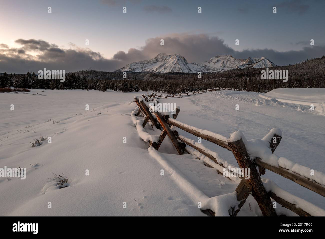 Beautiful winter scene with Idaho Sawtooth’s and fence Stock Photo - Alamy