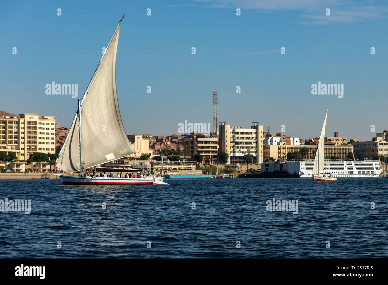 Aswan, Egypt; January 18, 2024: See feluccas and river cruisers on the ...