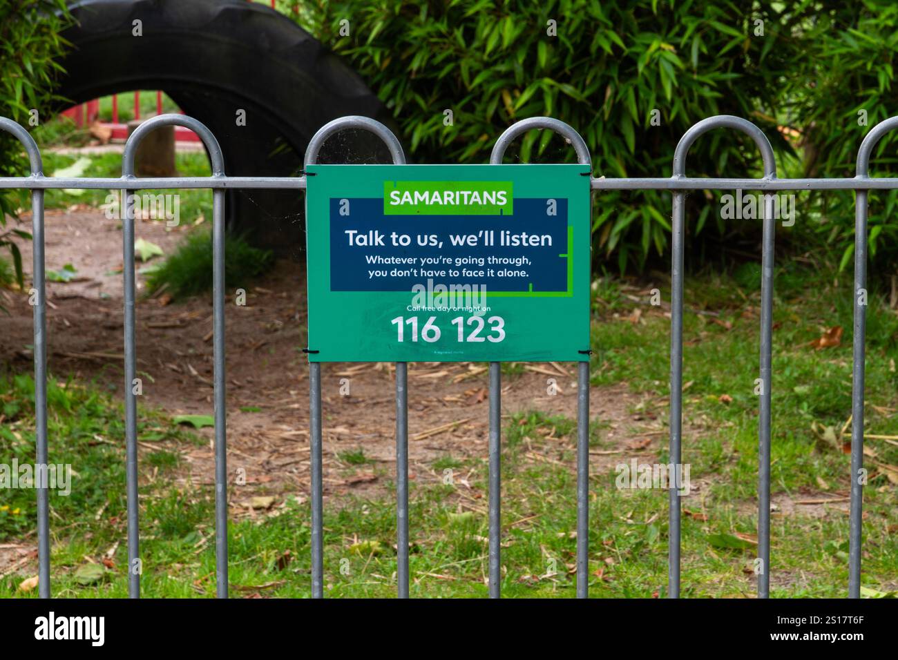 TAUNTON, ENGLAND JULY 30 2021: Sign by weir for the Samaritans with ...