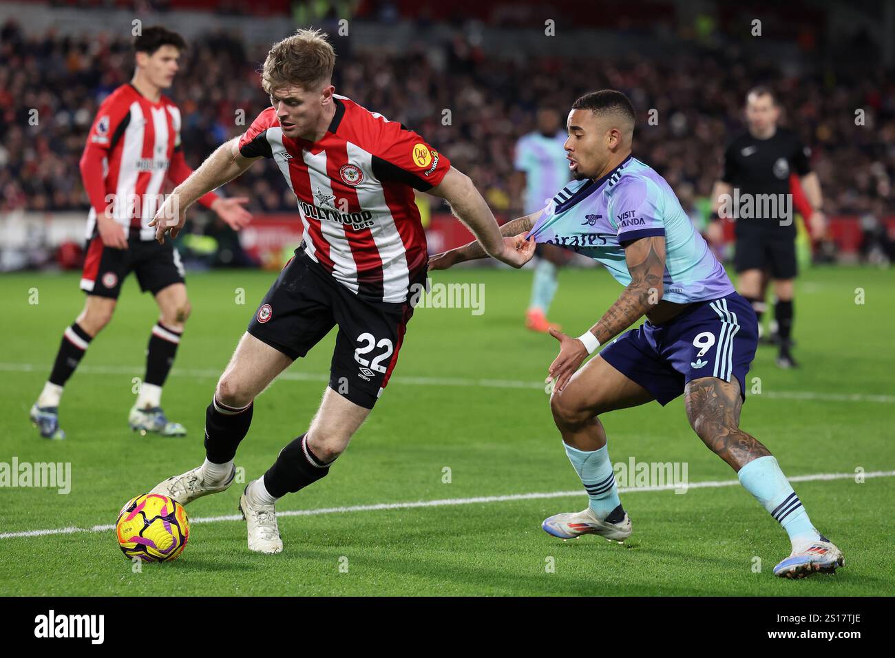 London, UK. 1st Jan, 2025. Nathan Collins of Brentford and Gabriel ...