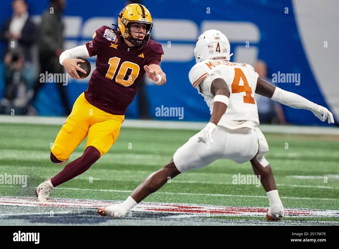 Arizona State quarterback Sam Leavitt (10) runs against Texas defensive ...