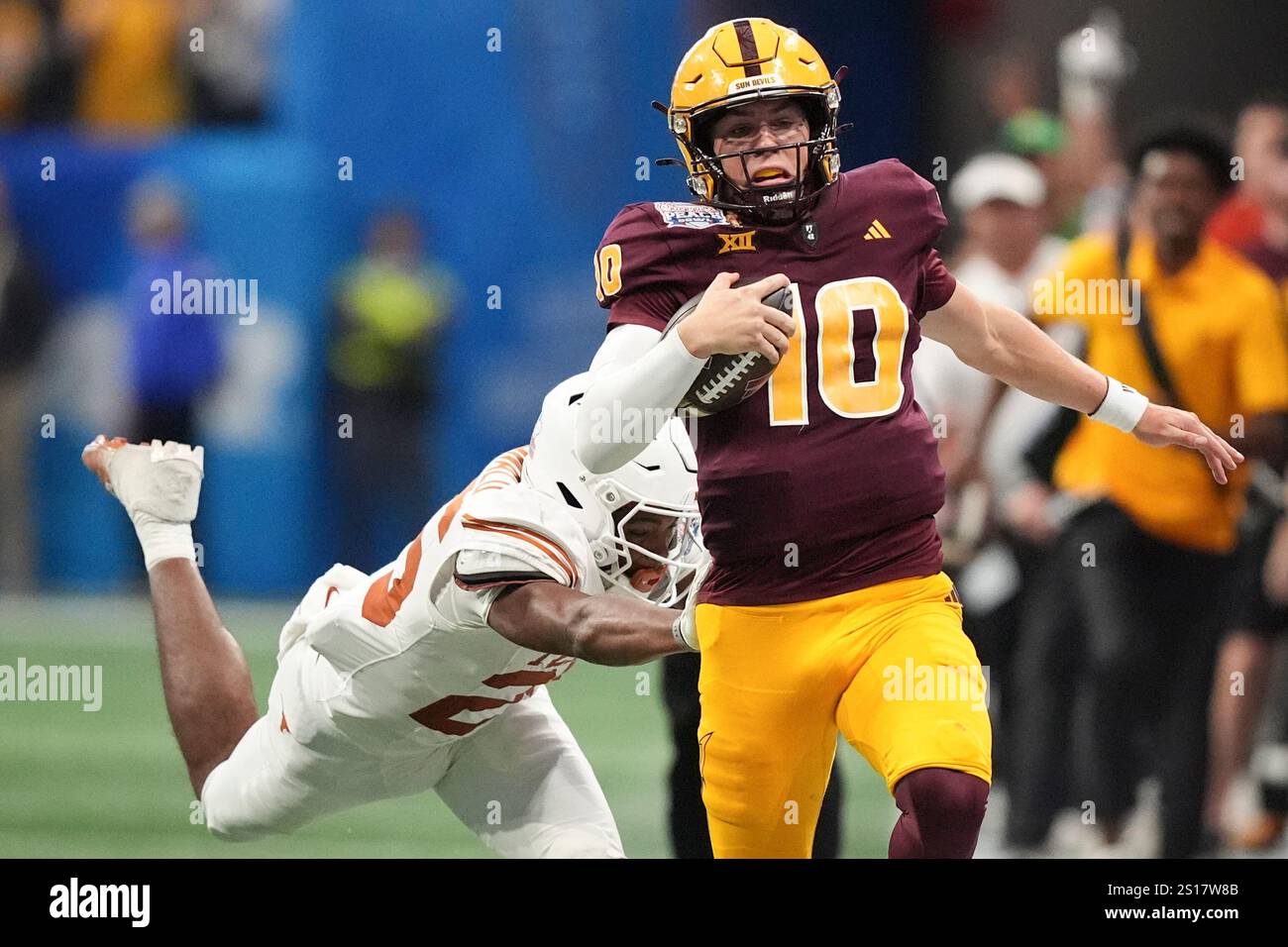 Arizona State quarterback Sam Leavitt (10) runs against Texas defensive ...