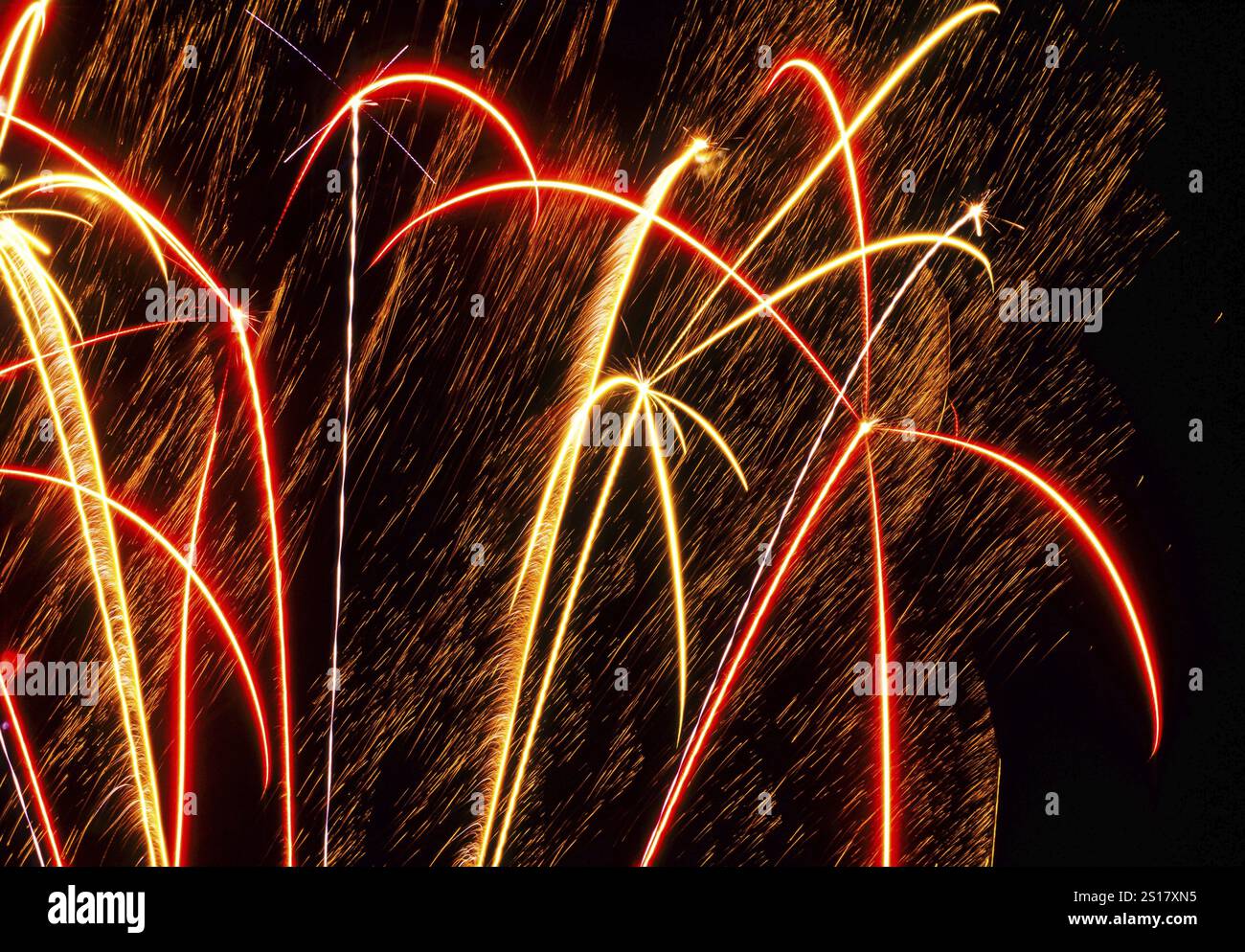 New Year's Eve fireworks, vivid fireworks in the night sky with golden ...