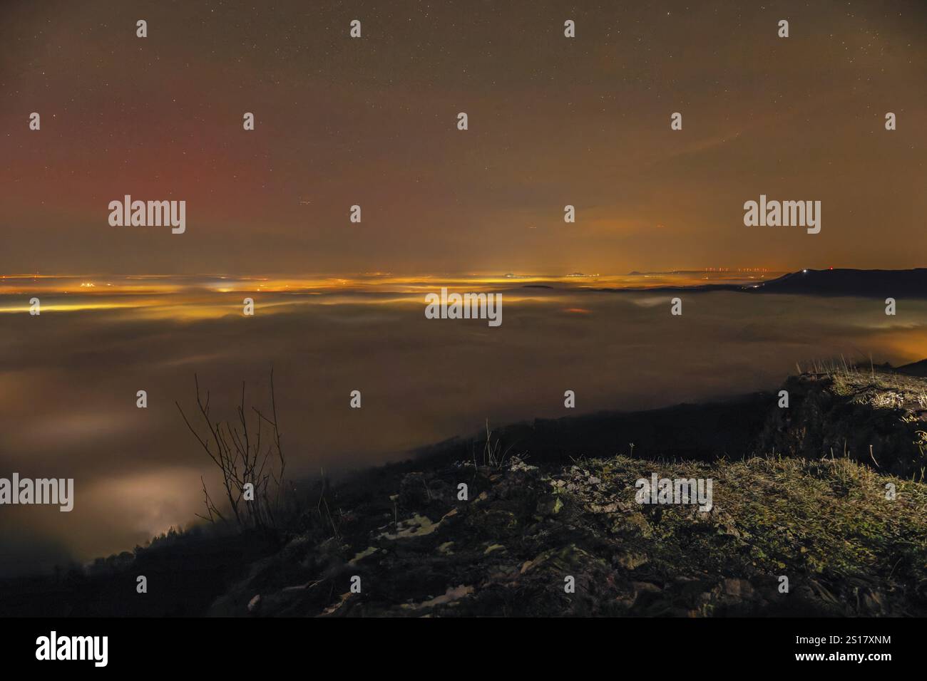 Firework lights under the sea of fog. New Year's Eve fireworks 2024 and ...