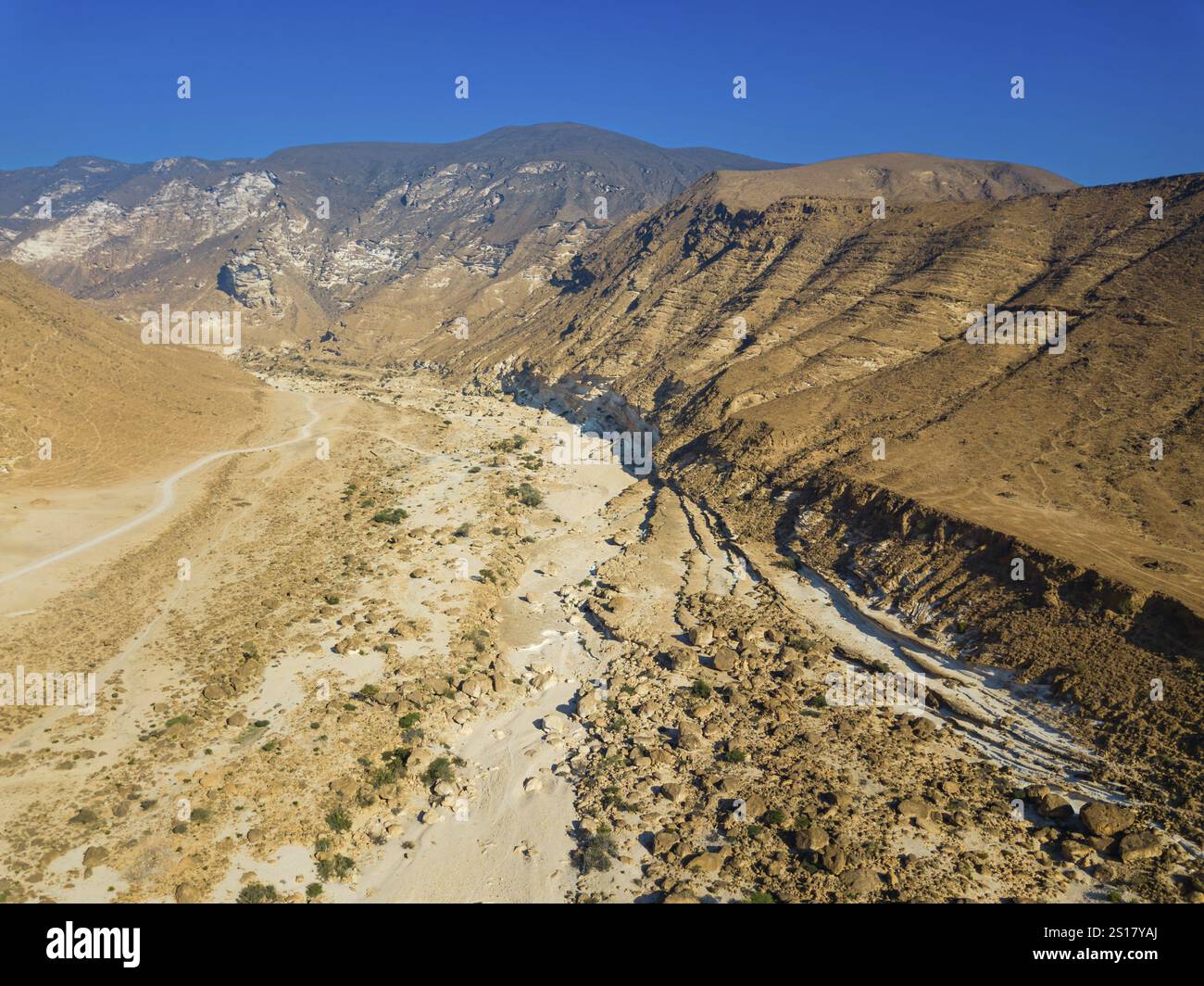 Landscape in Oman, mountains, Wadi Ashawq, road, dry riverbed Salalah ...