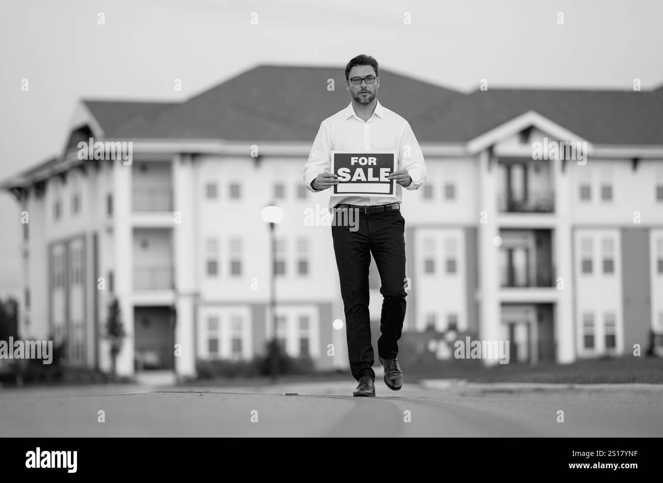 Caucasian real estate broker Black and White Stock Photos & Images - Alamy