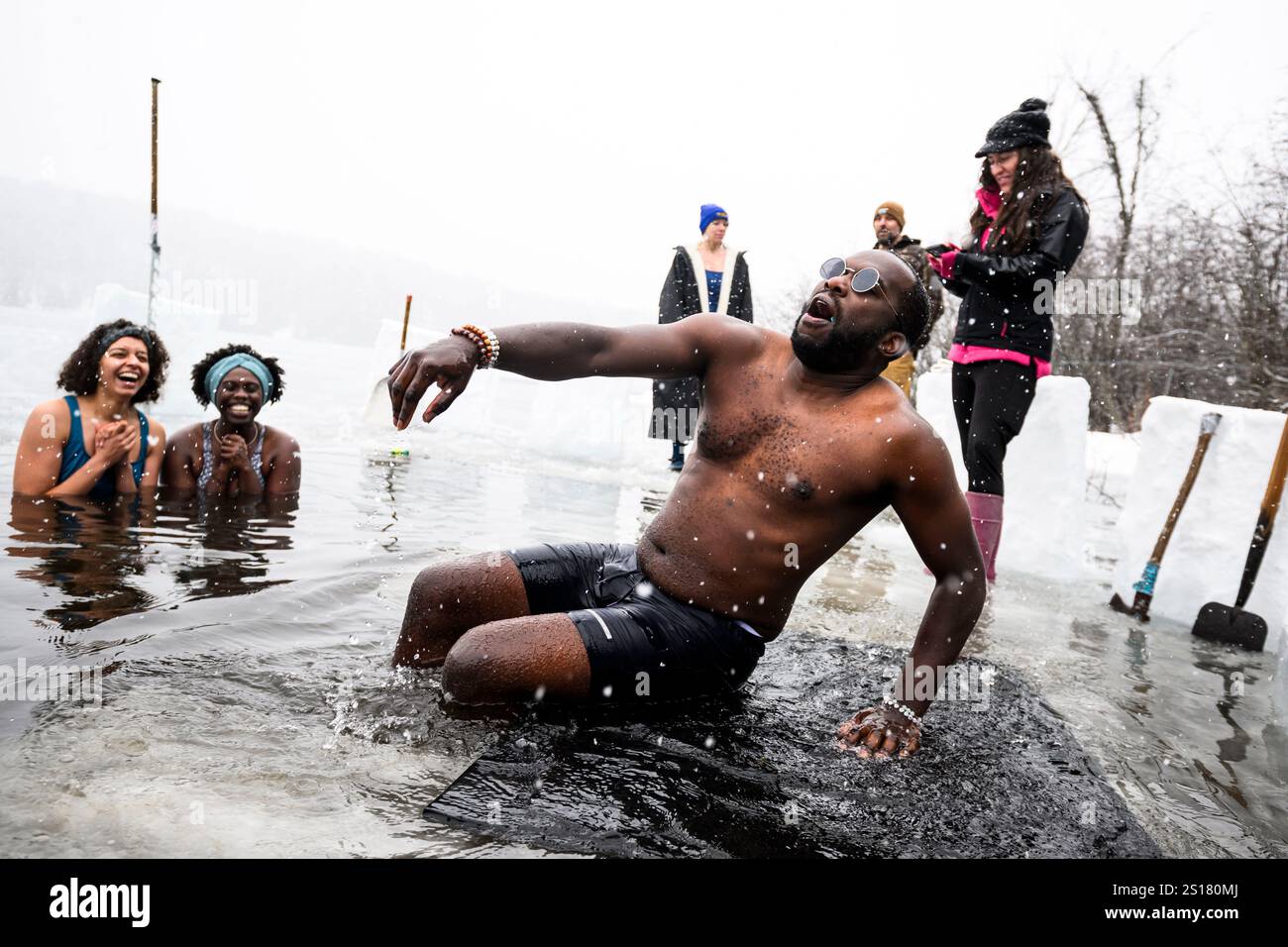 Chelsea, Can. 01st Jan, 2025. Frank Iteriteka clambers out of the icy ...