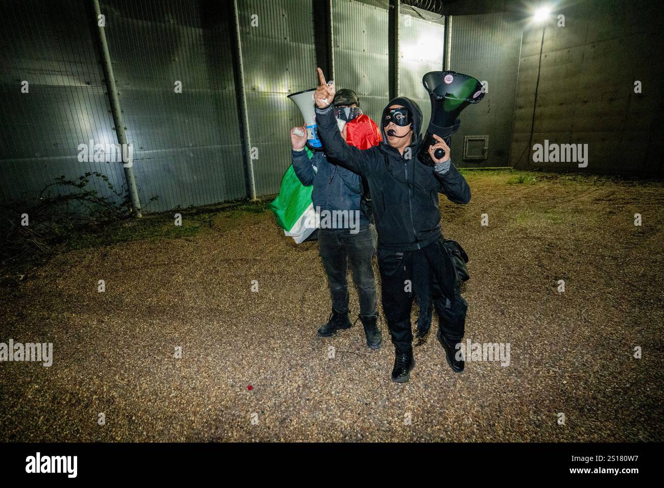 Protestors from "Palestine Action" call out their support through a ...