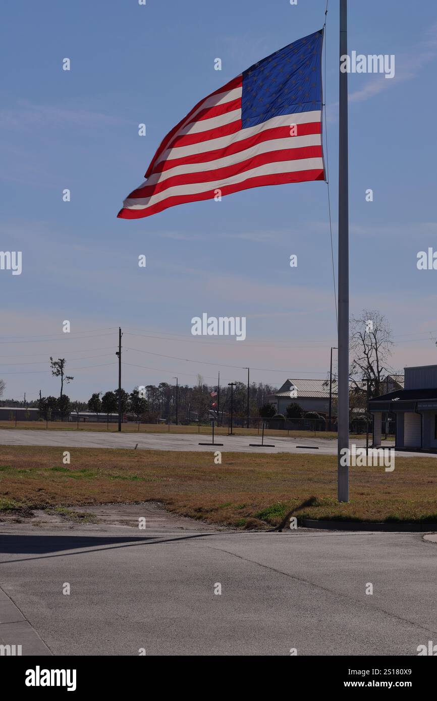 The United States flag flying at half mask outside the Town Hall in ...