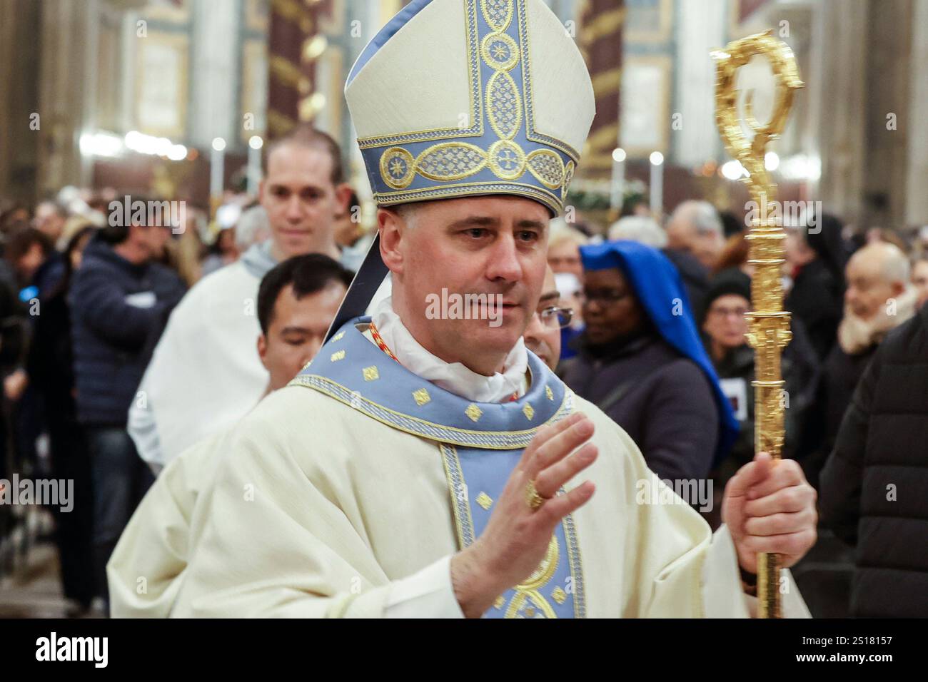 Rome, Italy. 1st Jan, 2025. Cardinal Rolandas Makrickas waves to the ...